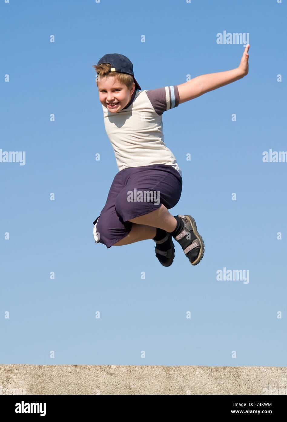 One boy jumping hi-res stock photography and images - Alamy
