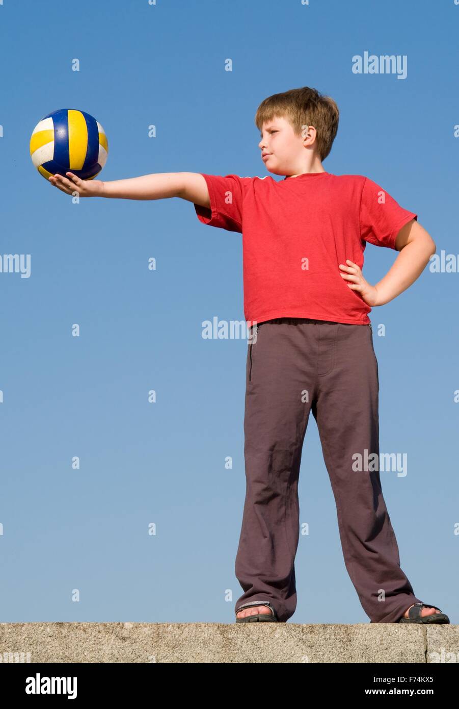 boy with volleyball ball Stock Photo - Alamy