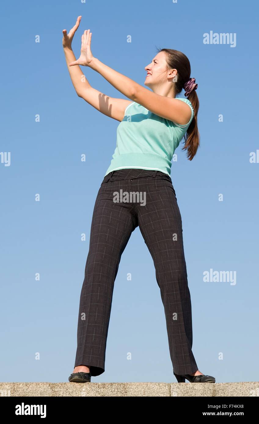 woman holding up her hands Stock Photo - Alamy