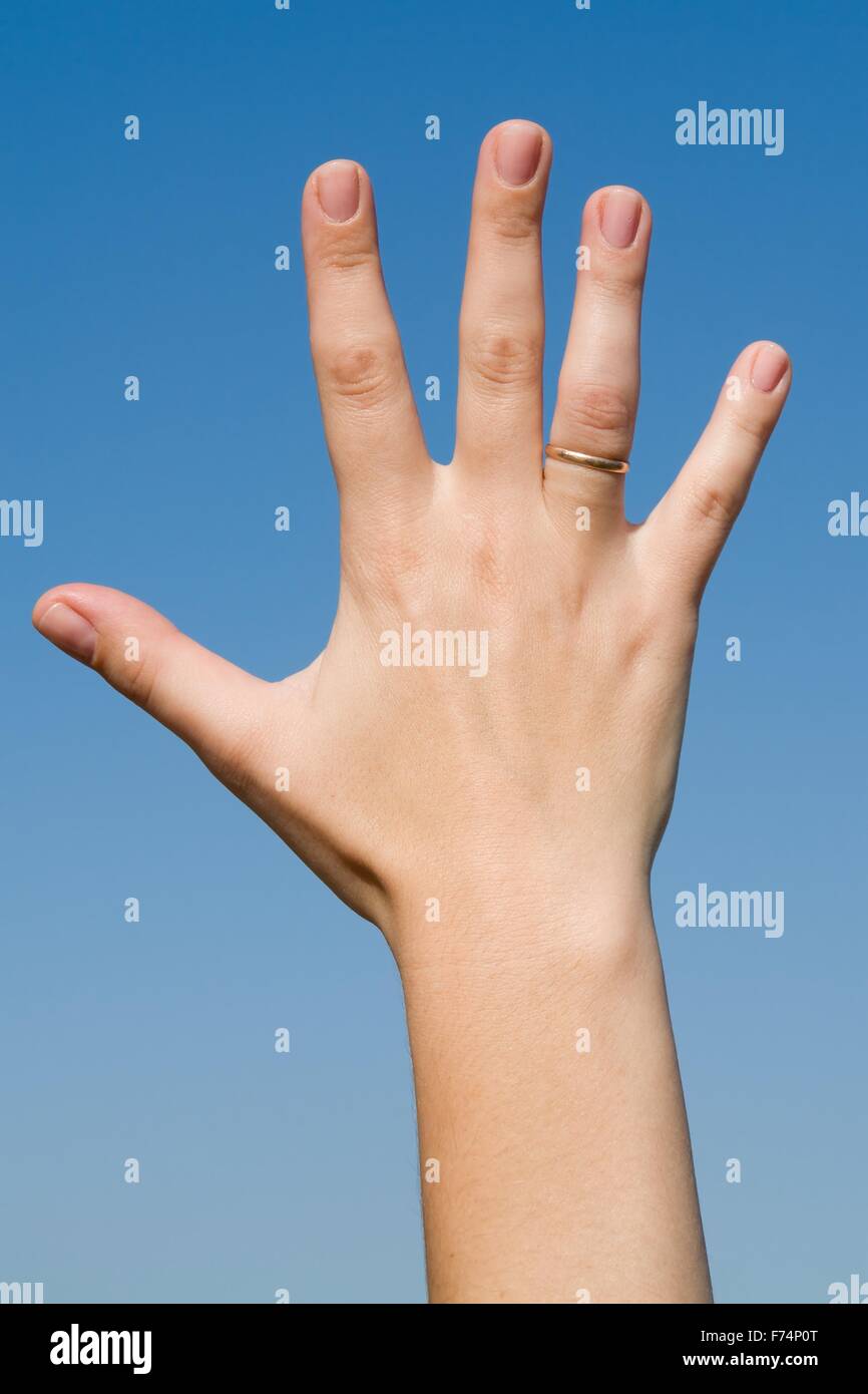 hand with a ring Stock Photo - Alamy