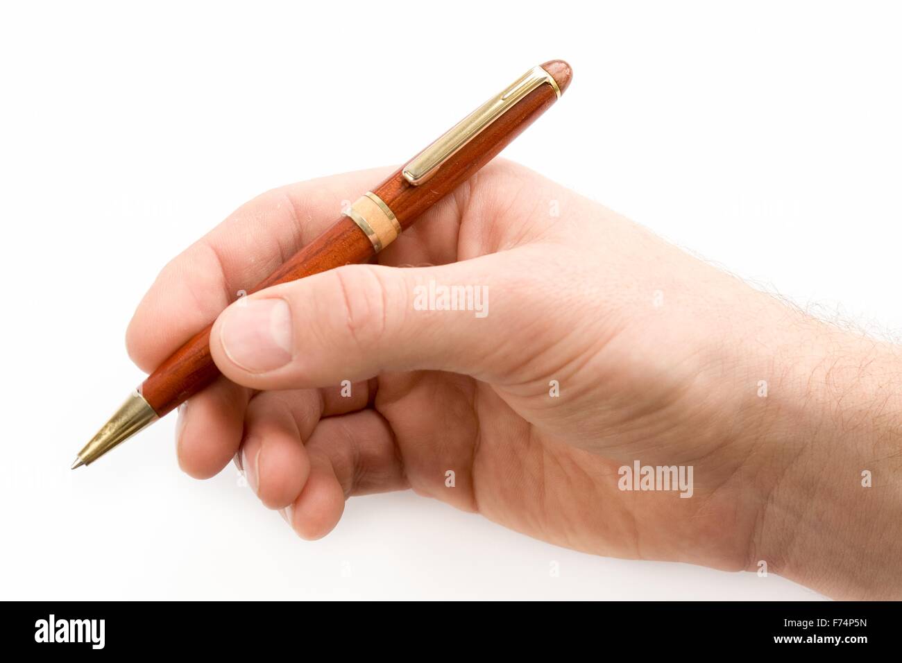 Hand with a pen Stock Photo - Alamy