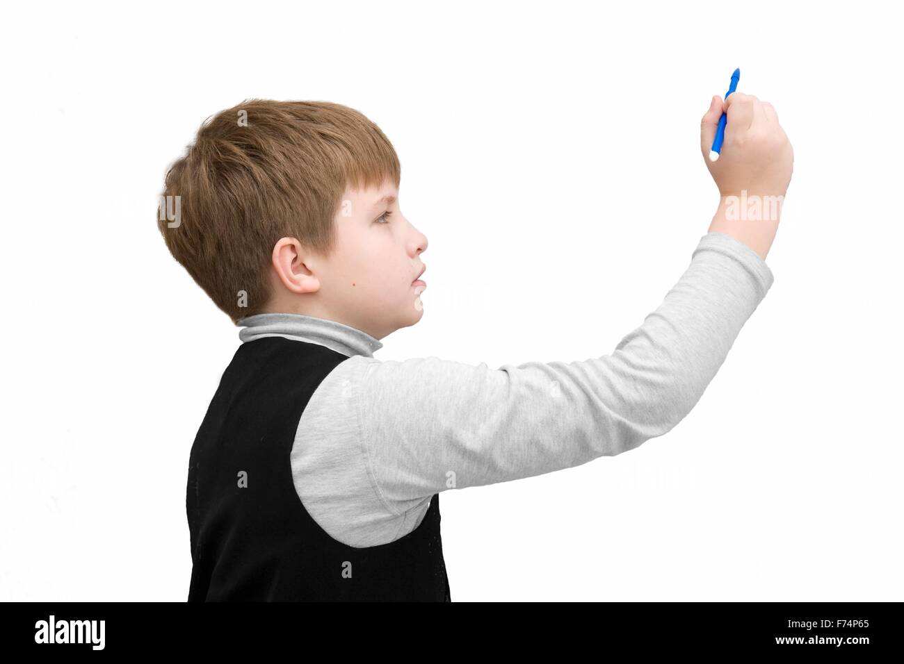 schoolboy with pen Stock Photo - Alamy