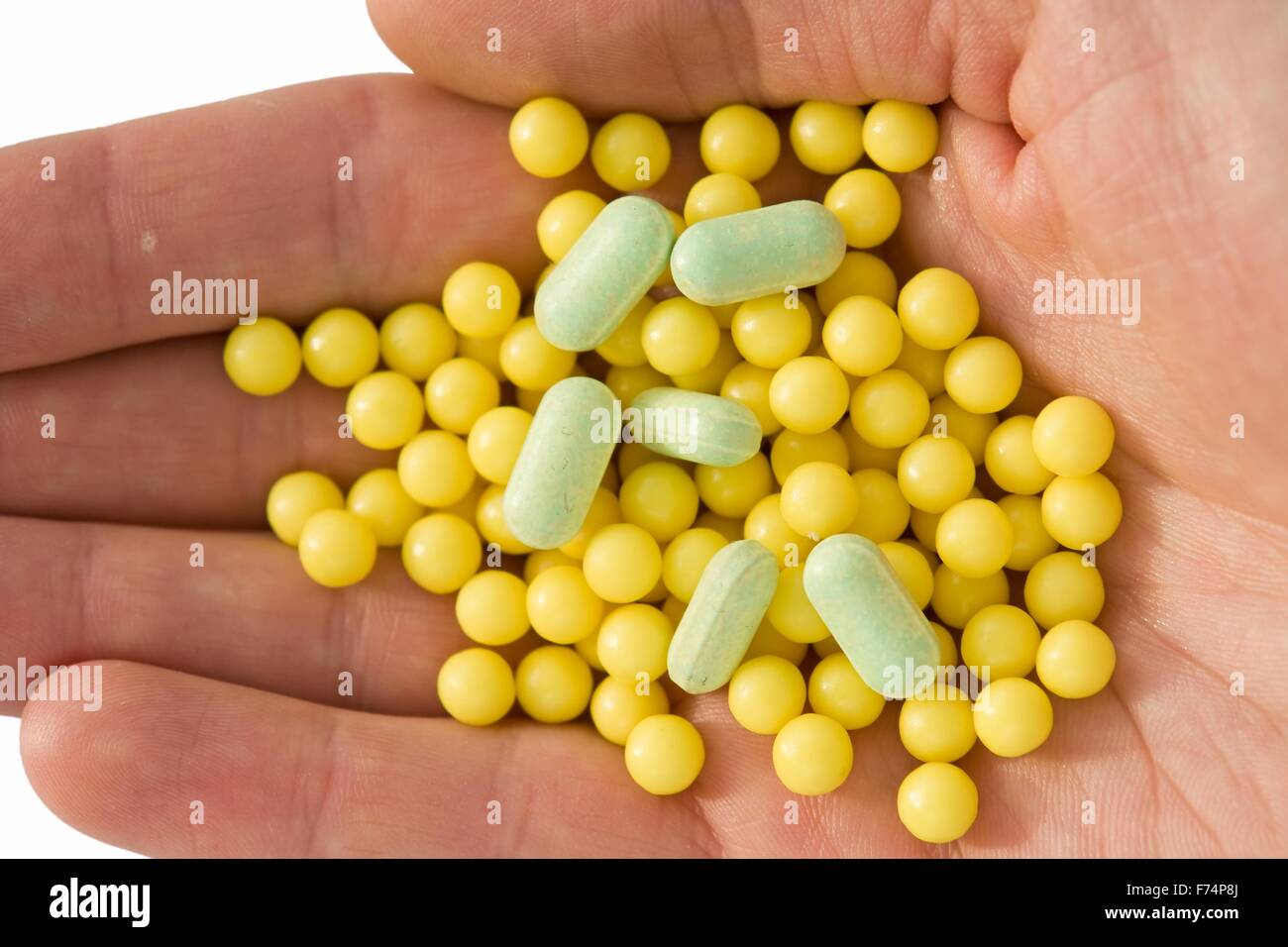 hand with pills Stock Photo - Alamy