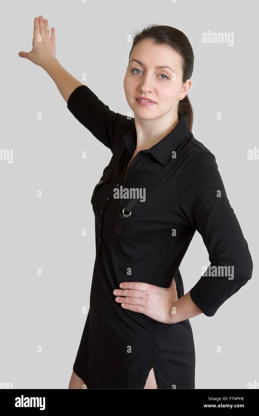 The woman shows a hand Stock Photo - Alamy