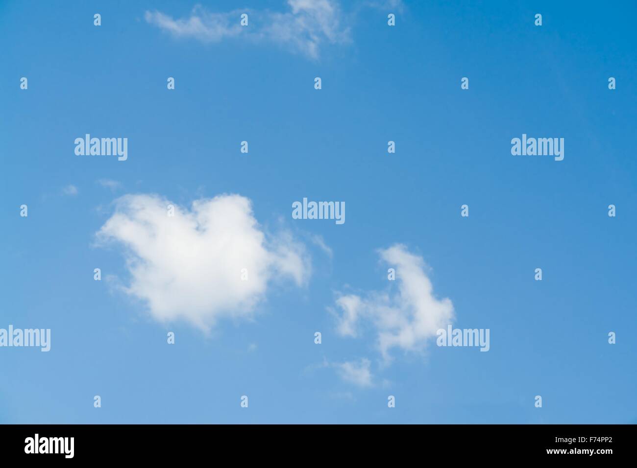 Small white cloud Stock Photo - Alamy