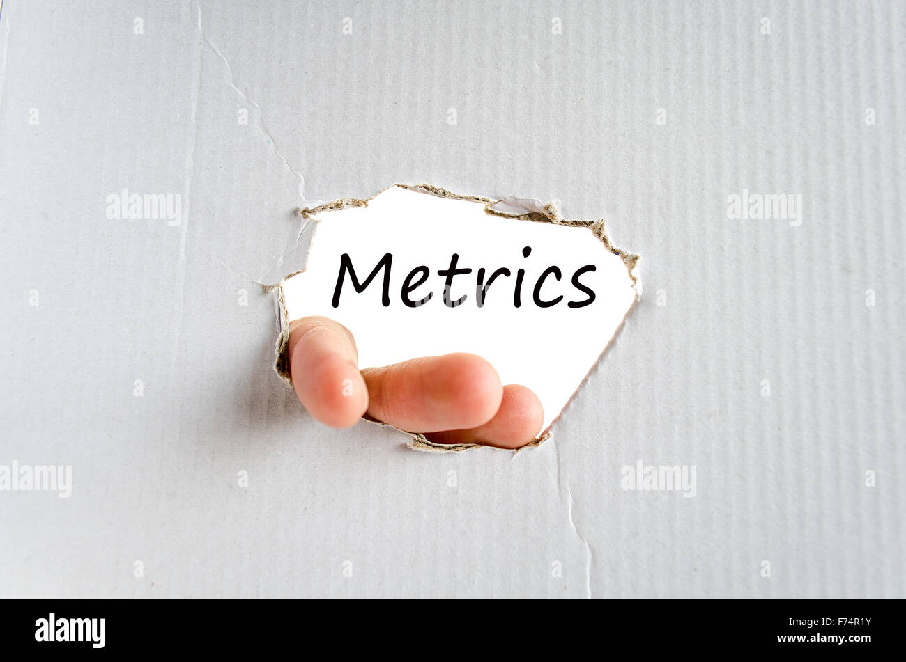 Metrics text concept isolated over white background Stock Photo - Alamy