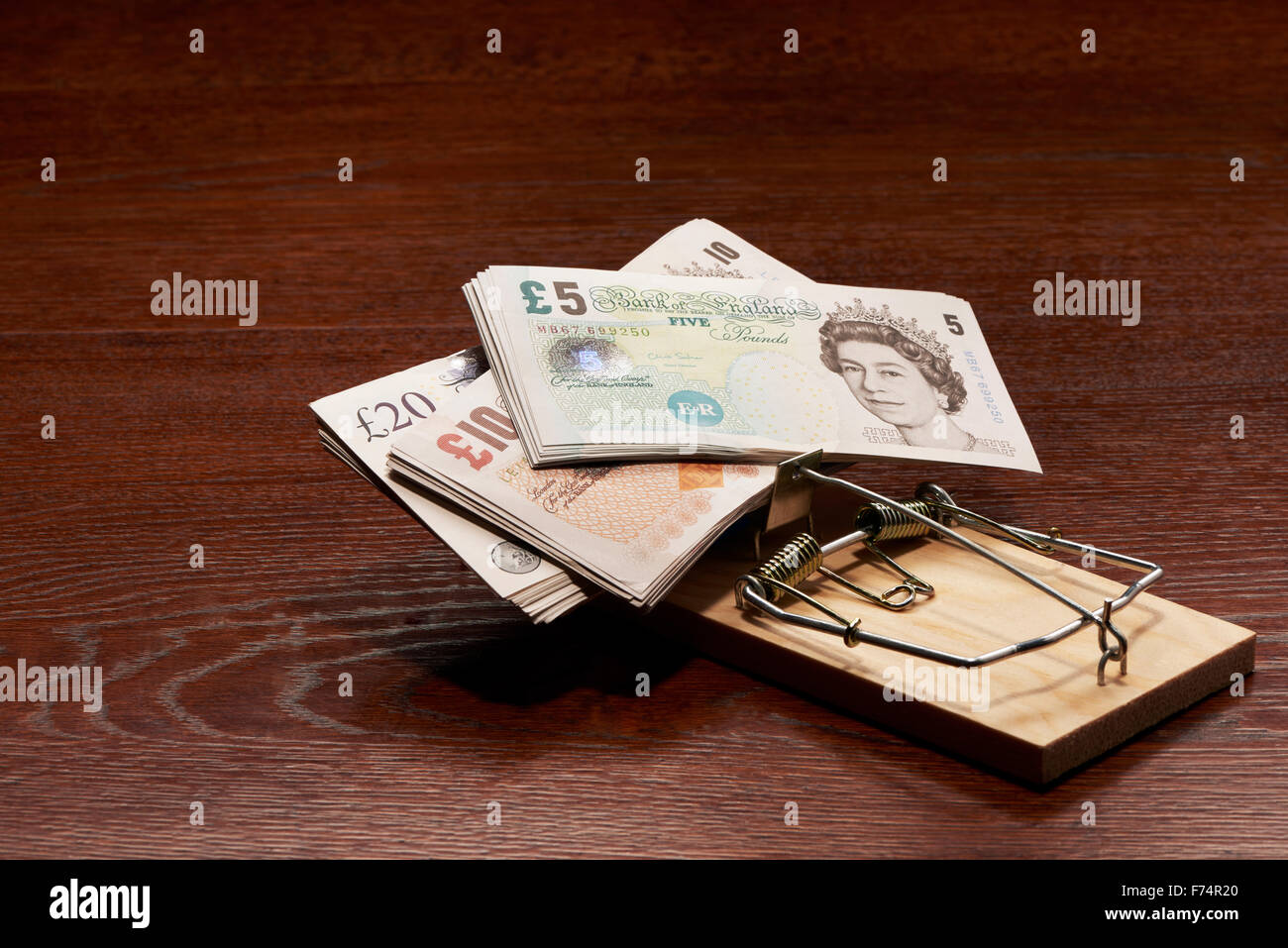 Money in Mouse Trap Stock Photo - Alamy