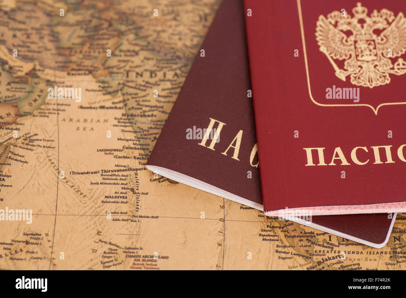 Russian Passports on map close up Stock Photo - Alamy