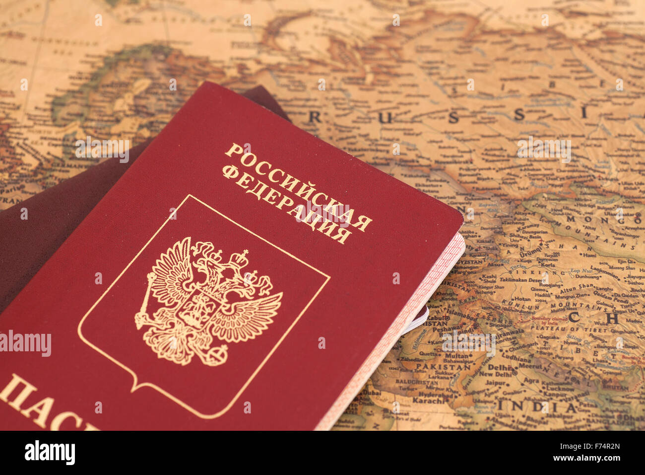 Russian Passports on map close up Stock Photo - Alamy
