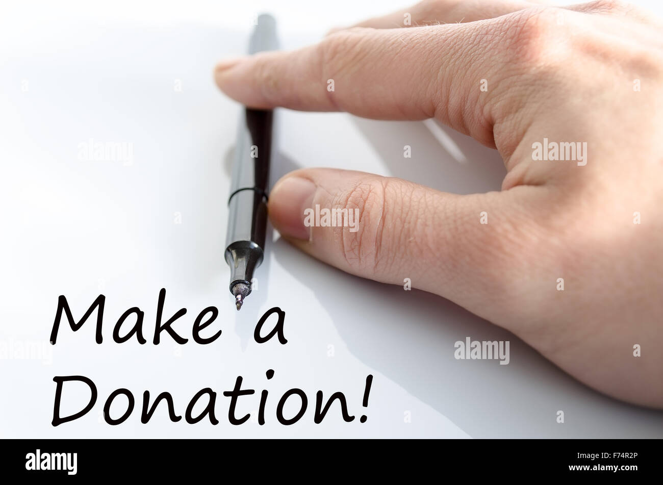 Make a donation text concept isolated over white background Stock Photo ...