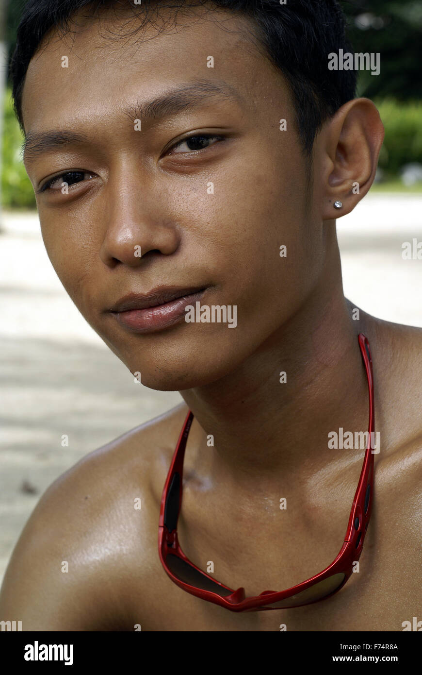 Asian malay man at beach Stock Photo - Alamy