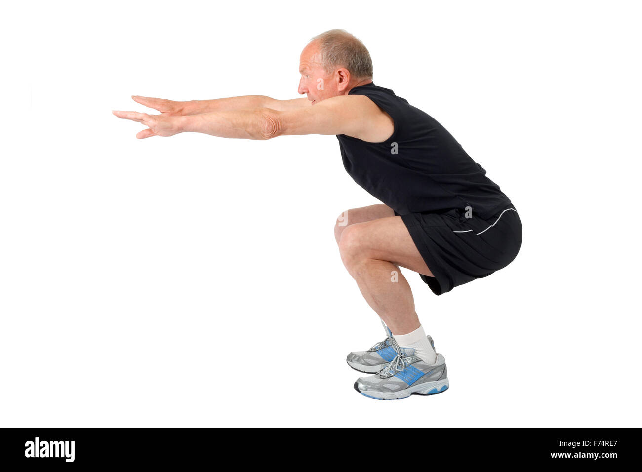 Squatting exercise Cut Out Stock Images & Pictures - Alamy