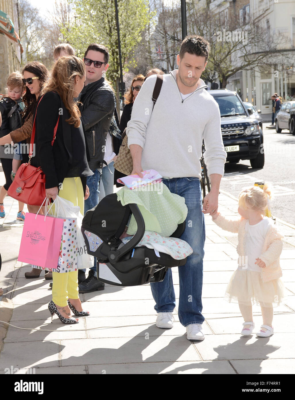 London, UK. 220314. Michelle Heaton, Hugh Hanley and Faith Michelle ...
