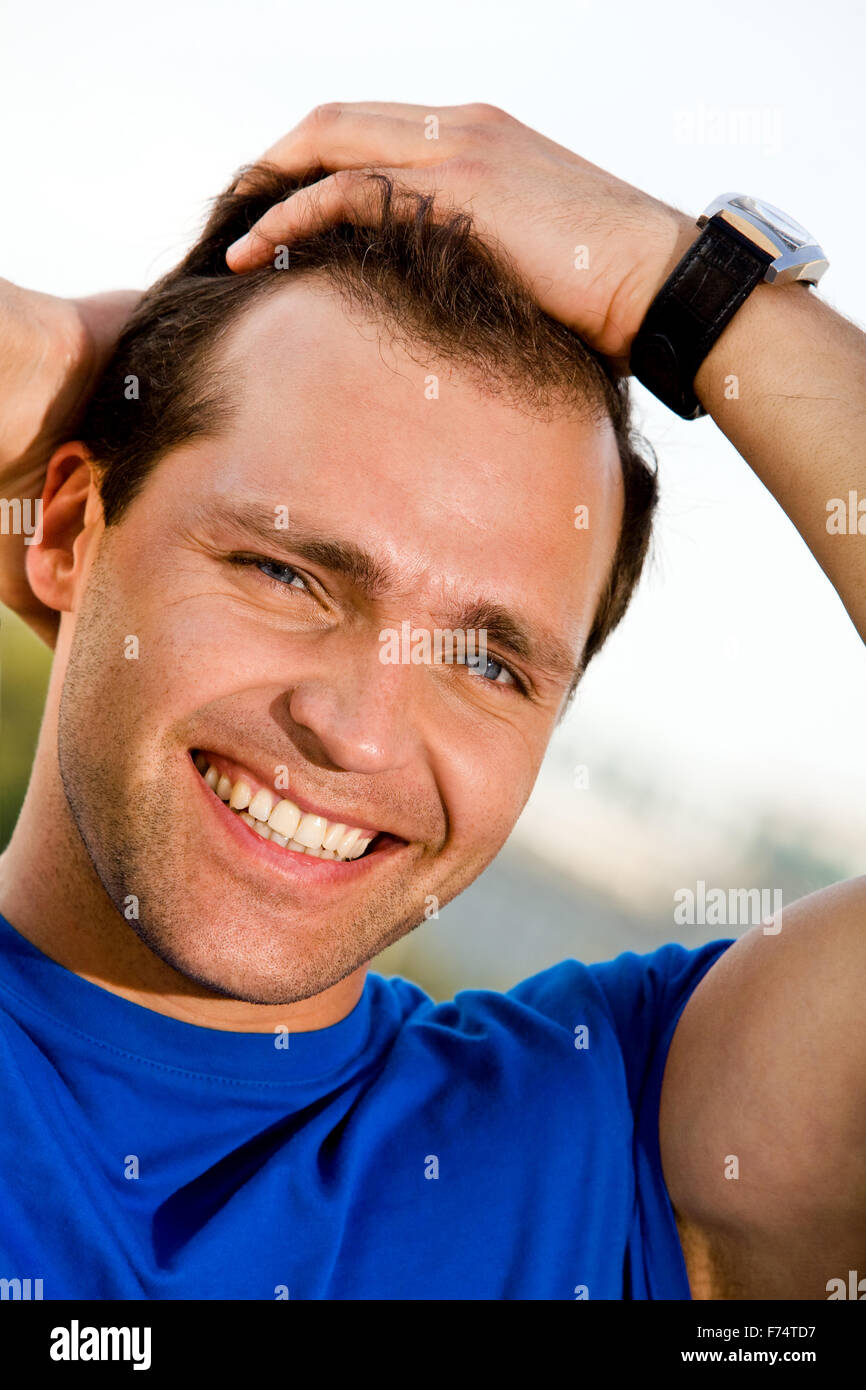 Smiling man outdoors Stock Photo - Alamy
