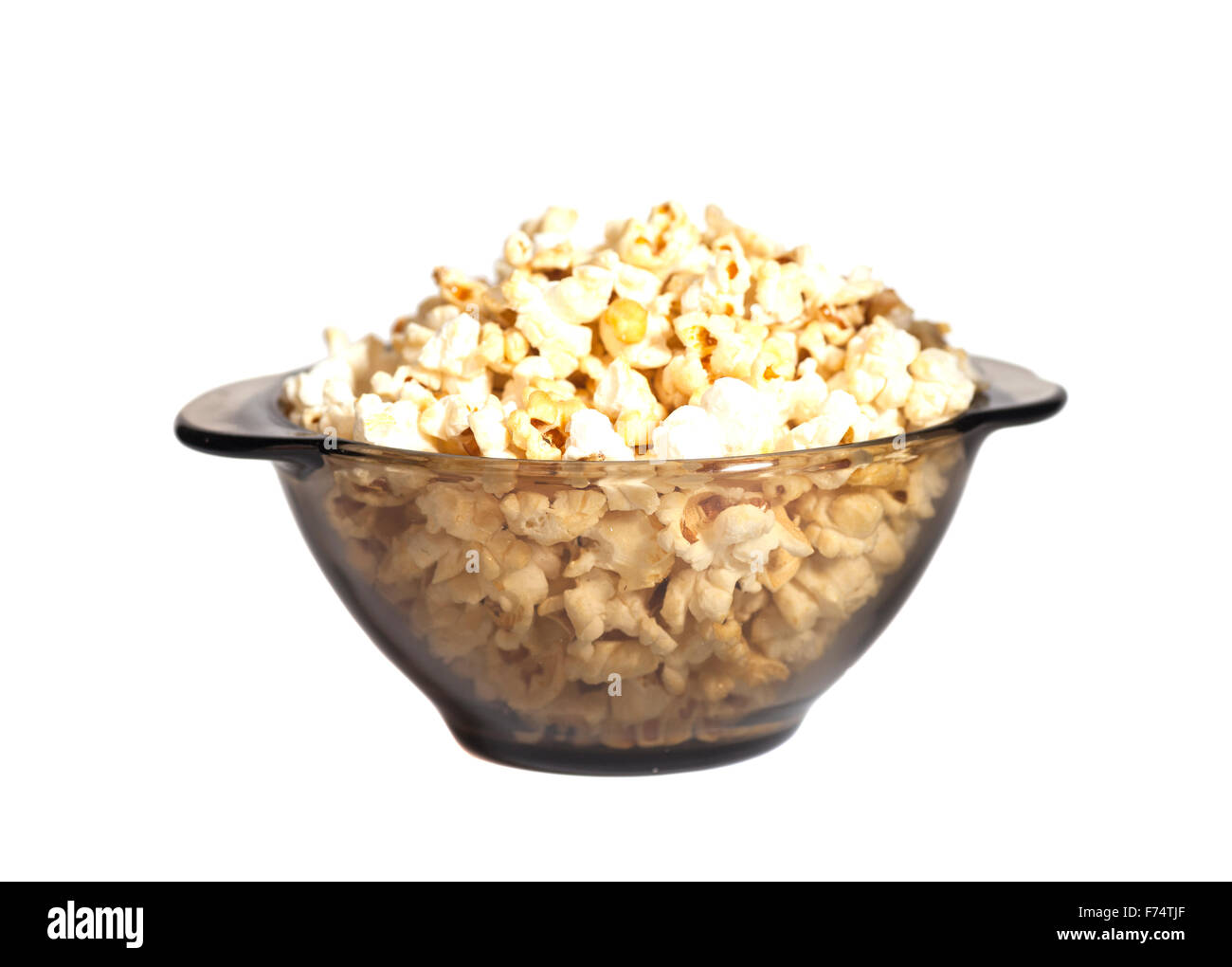 Popcorn in a glass bowl isolated on white Stock Photo - Alamy