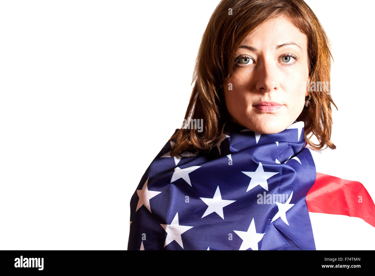 Woman wrapped in American flag on white Stock Photo - Alamy