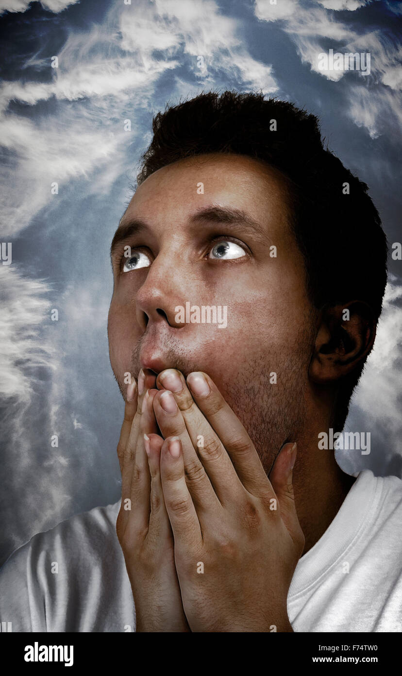 Man praying and looking up Stock Photo - Alamy
