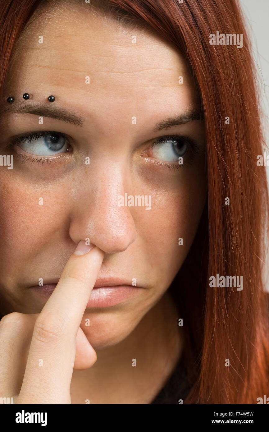 Girl picking her nose Stock Photo - Alamy