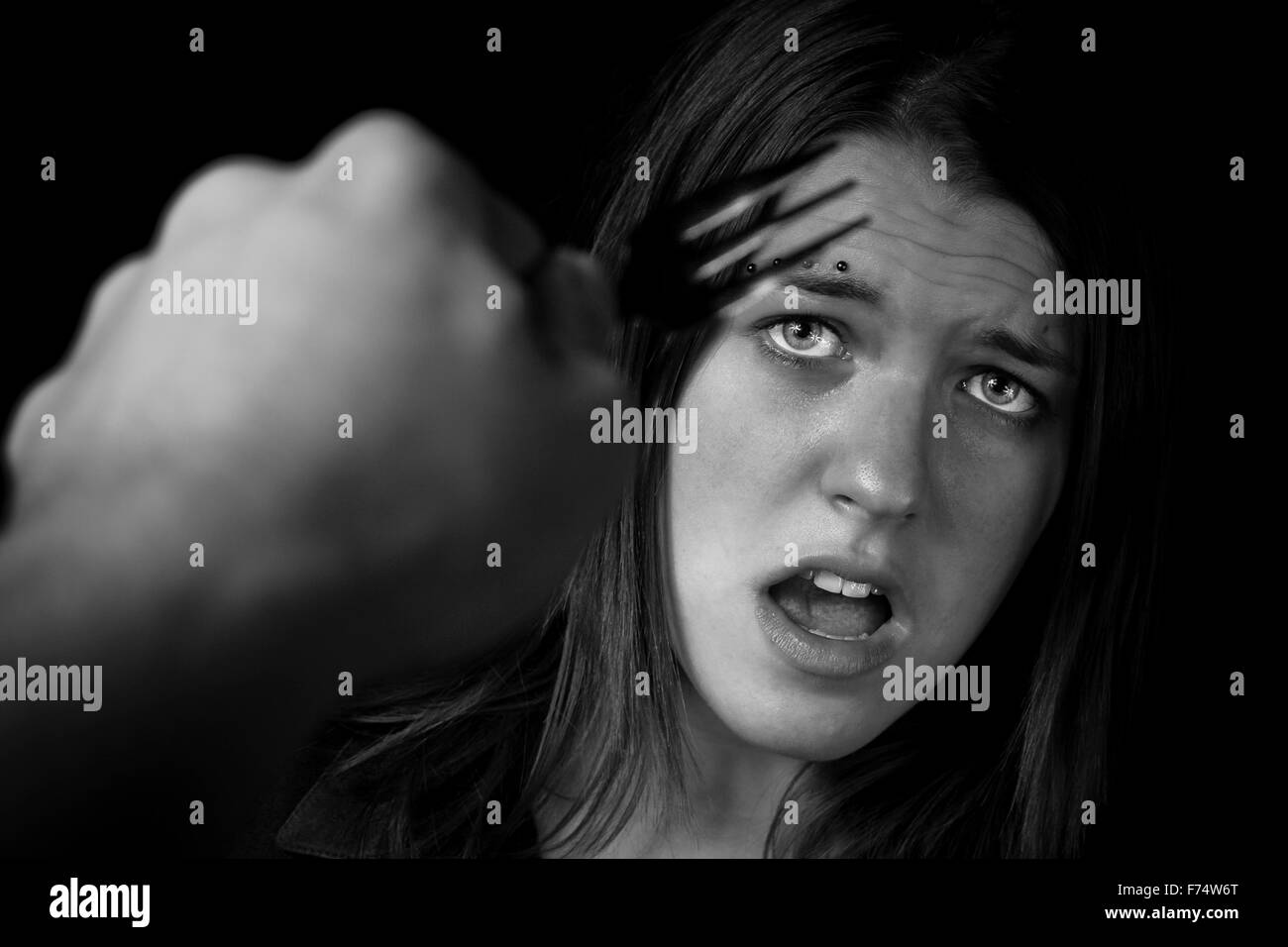 Girl intimidated with a fork Stock Photo - Alamy