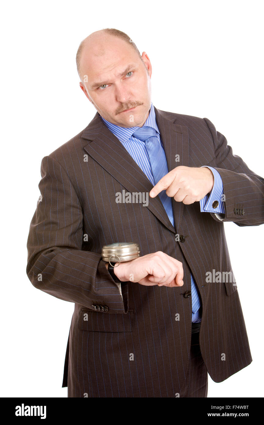 Pointing at his watch Stock Photo - Alamy