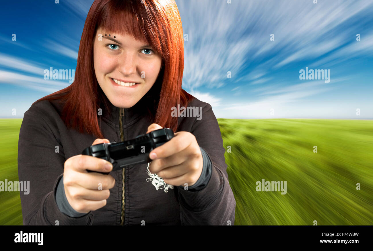Girl playing video game console Stock Photo - Alamy