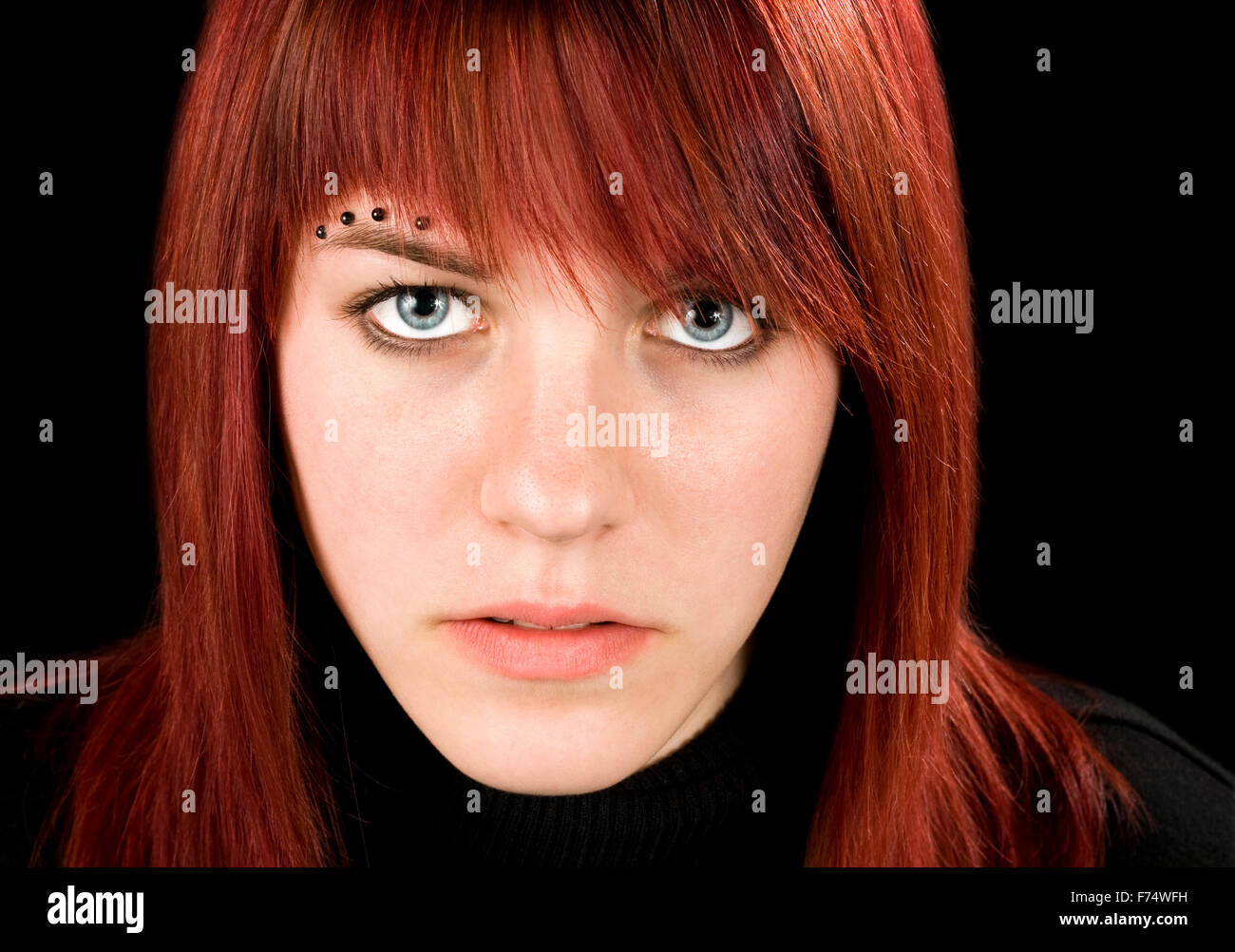 Beautiful girl staring at camera Stock Photo - Alamy