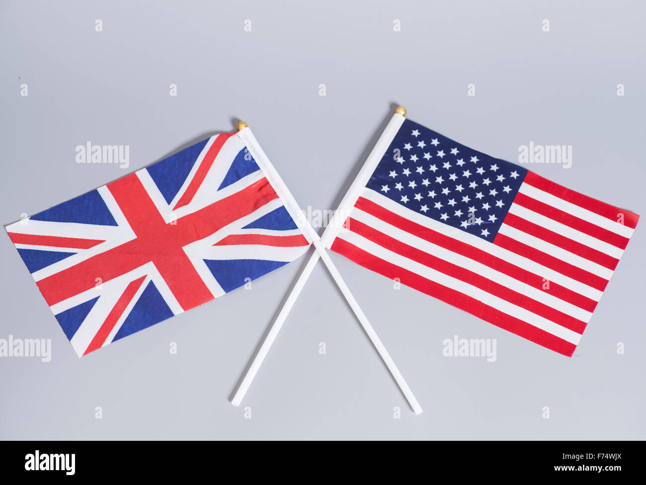 British (UK) and American flags on gray background Stock Photo - Alamy