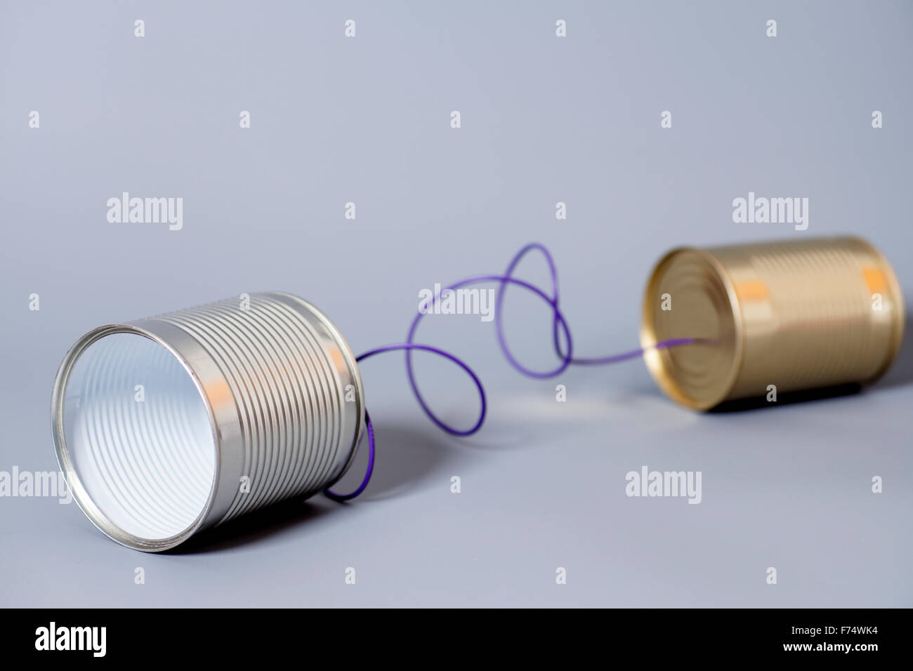 tin can phone.communication concept Stock Photo - Alamy