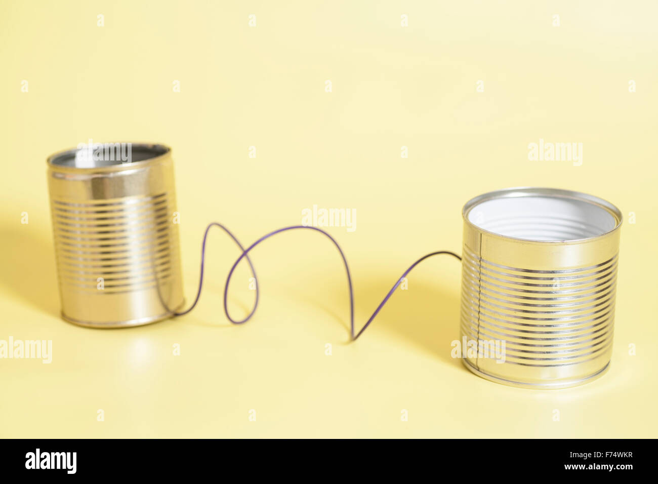 tin can phone.communication concept Stock Photo - Alamy