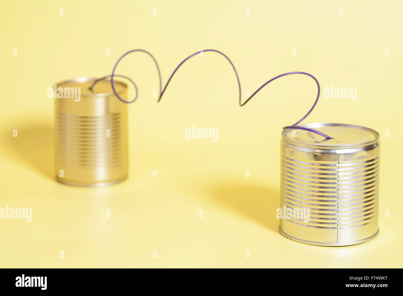 tin can phone.communication concept Stock Photo - Alamy