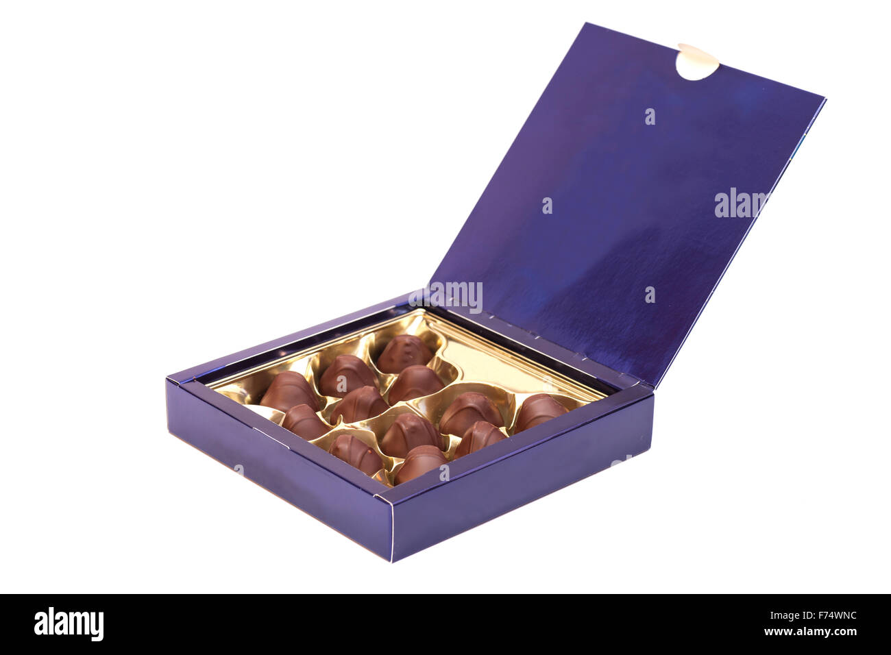 Open Box of chocolate candies isolated Stock Photo - Alamy