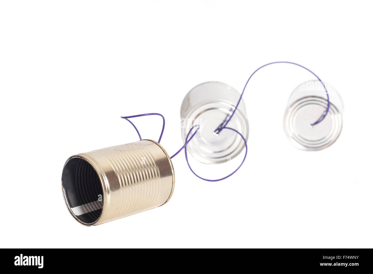 Tin can phone.Telecommunication concept Stock Photo - Alamy