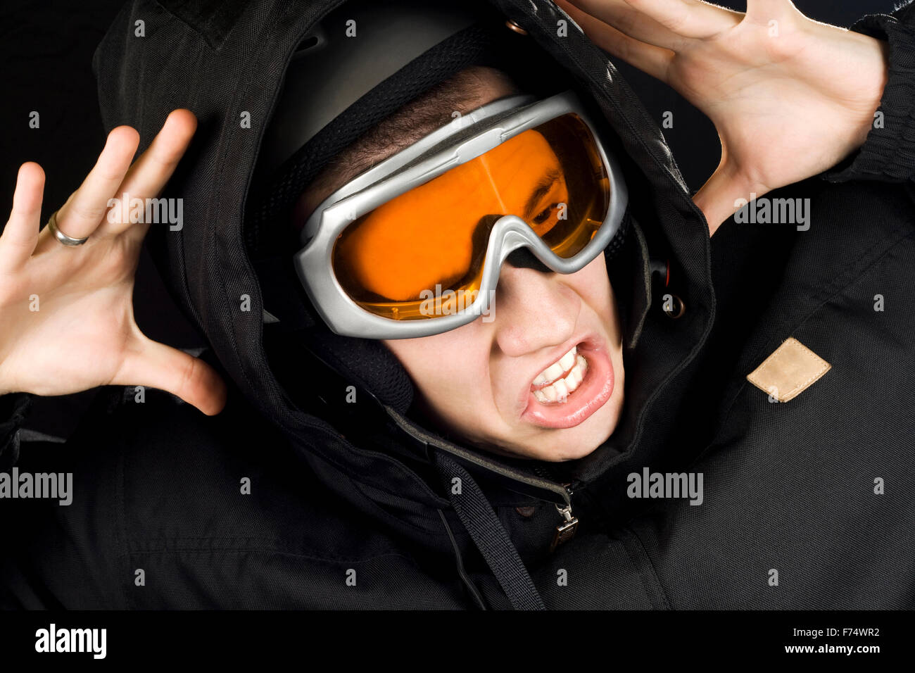 Snowboarding boy reacting on accident Stock Photo - Alamy