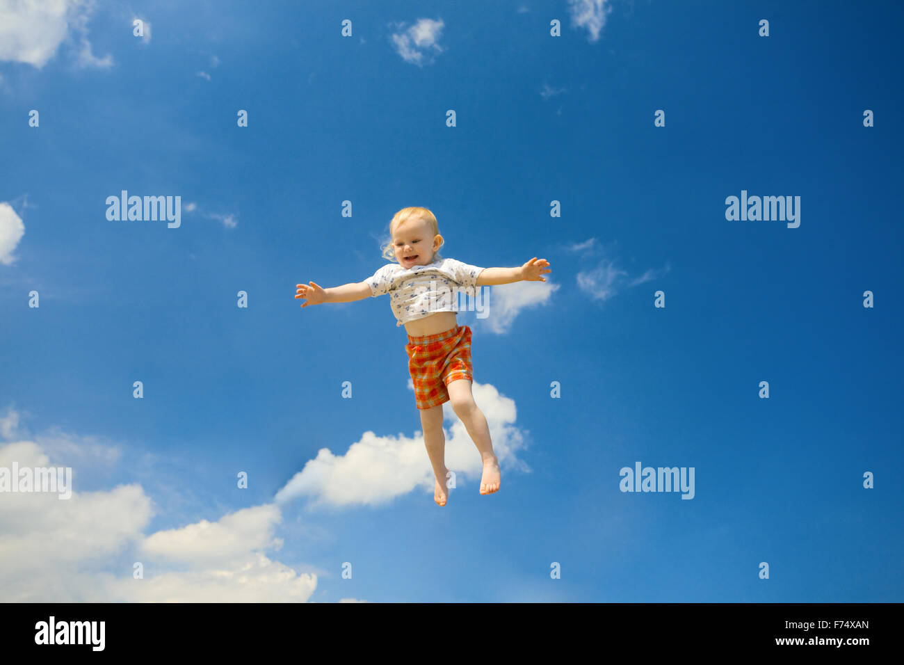 happy child fly in the sky Stock Photo - Alamy