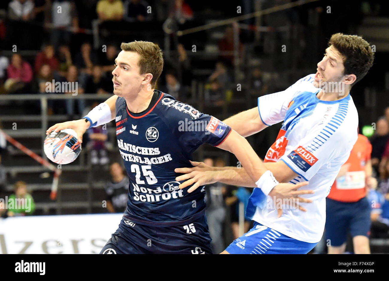 Flensburg, Germany. 25th Nov, 2015. Flensburg's Rasmus Lauge (L) in ...