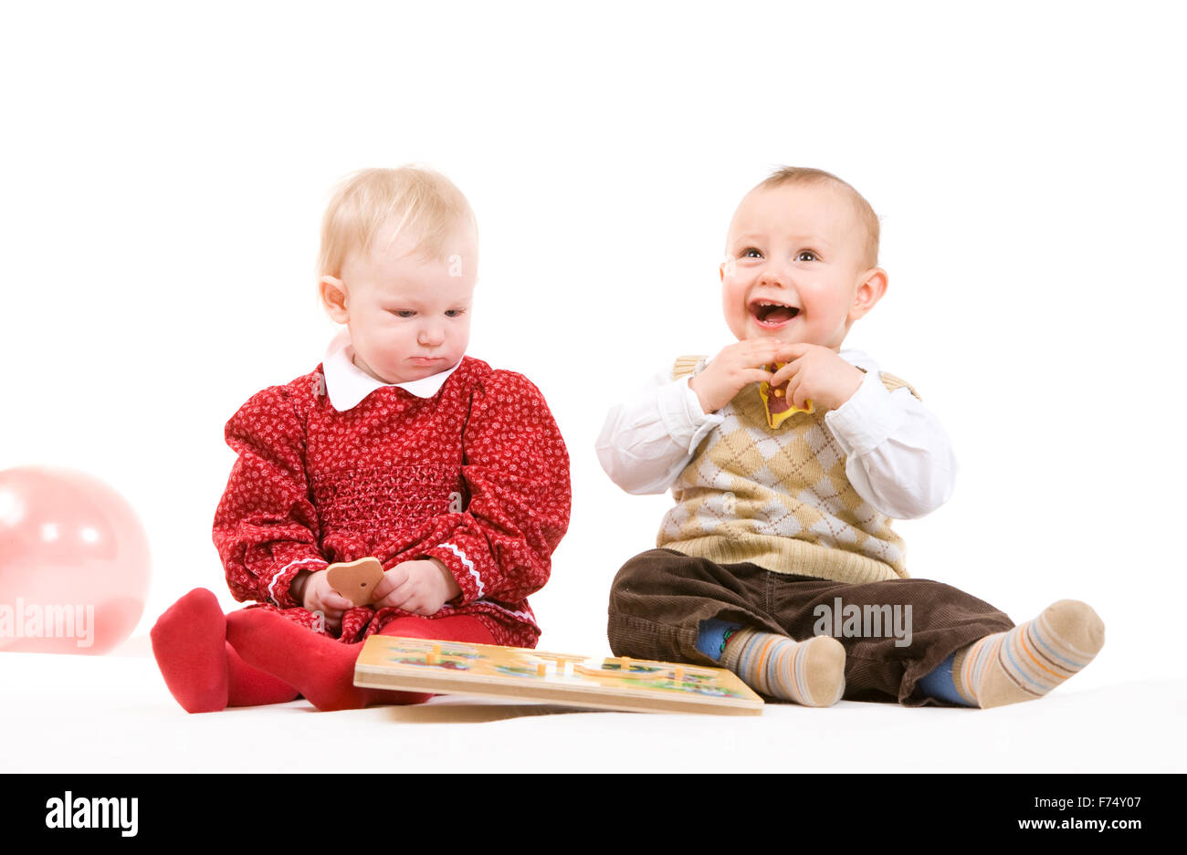 Children playing with balloons Cut Out Stock Images & Pictures - Alamy