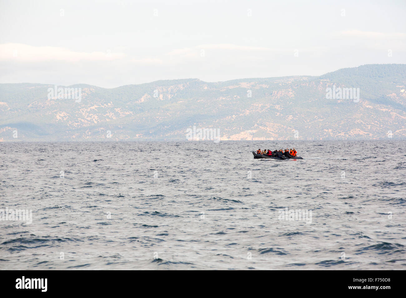 The person who is in charge of a boat hi-res stock photography and ...