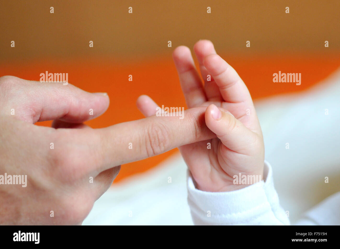 Children's pen in the hands of adult fingers Stock Photo - Alamy