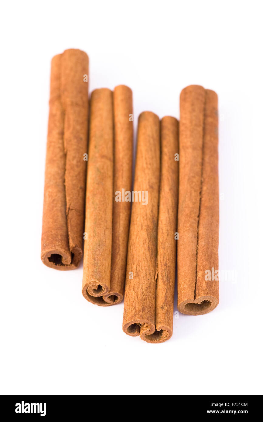 cinamon sticks on white Stock Photo - Alamy