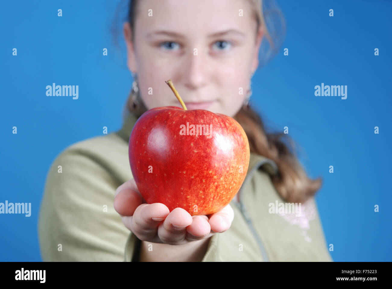girl handing apple Stock Photo - Alamy