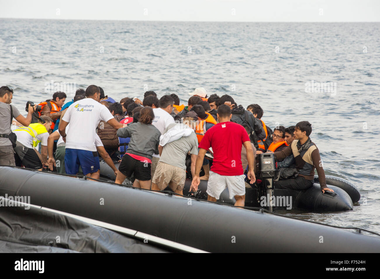 The person who is in charge of a boat hi-res stock photography and ...