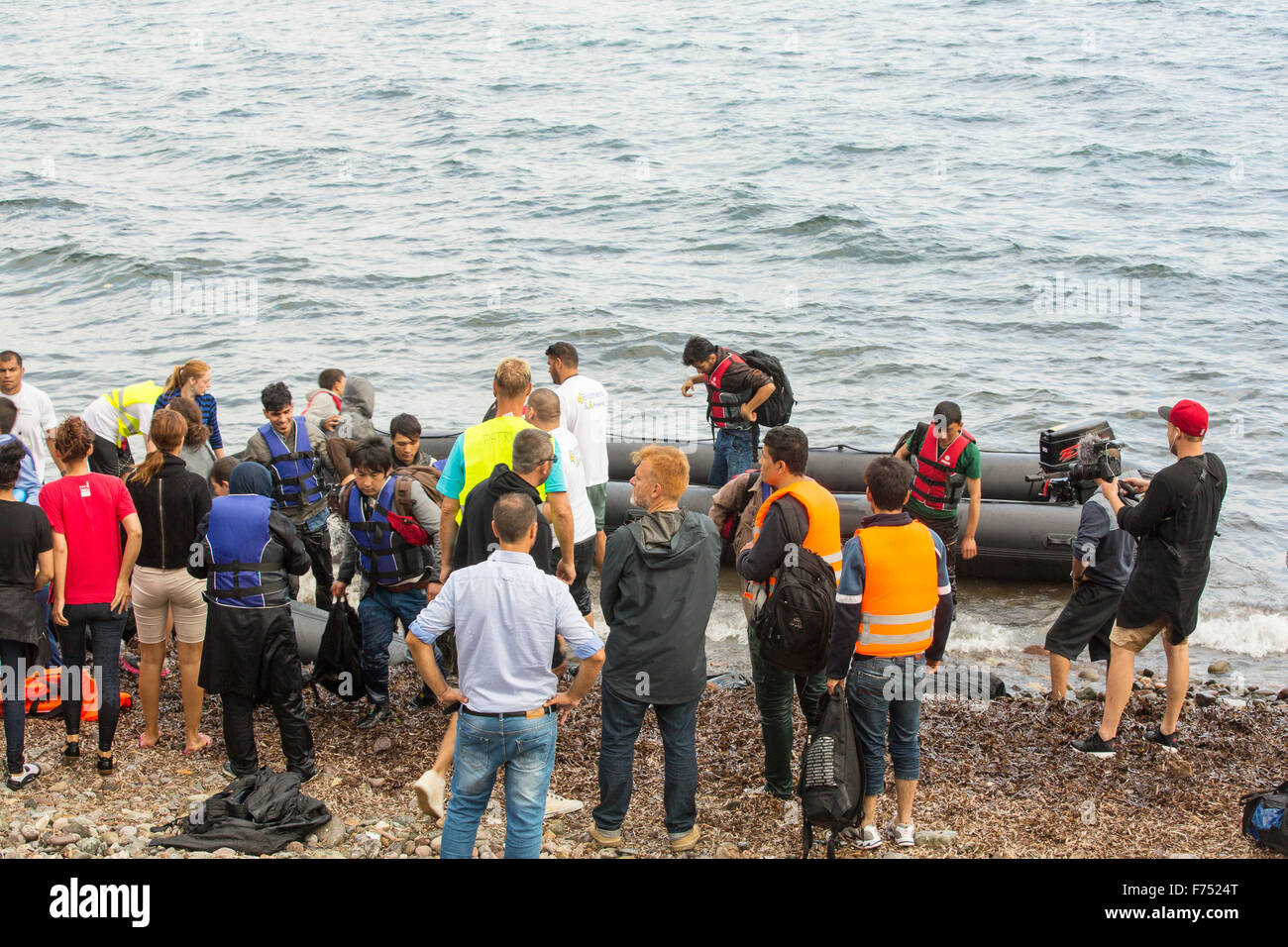 The person who is in charge of a boat hi-res stock photography and ...