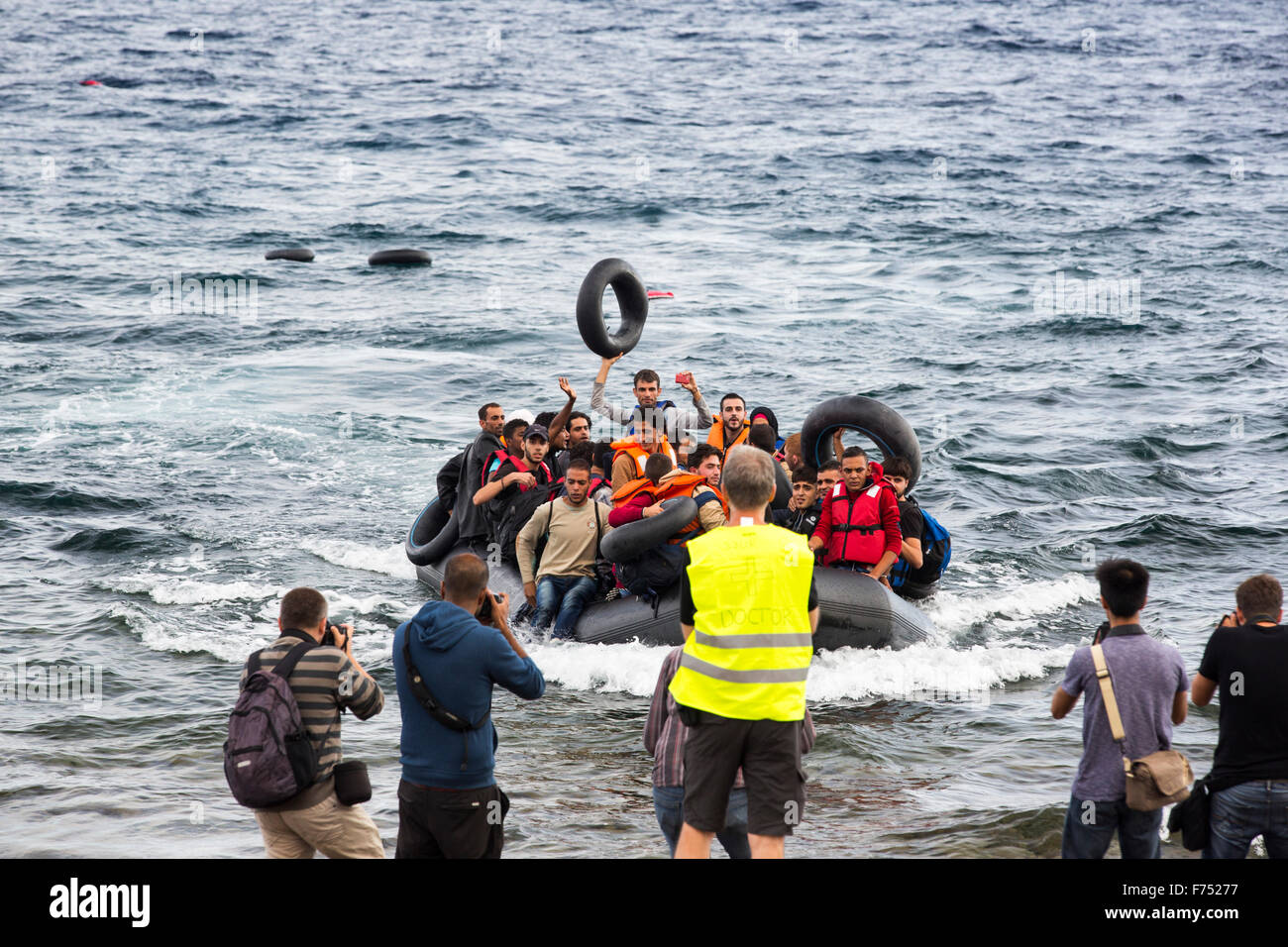 The person who is in charge of a boat hi-res stock photography and ...