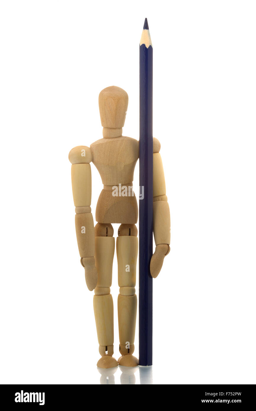 Manikin standing with pencil Stock Photo - Alamy