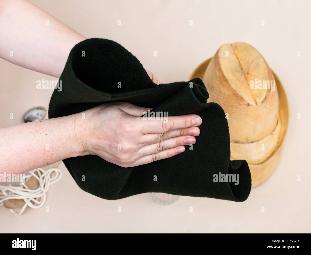 workshop for alpine felt hat making - hatter forming a felt hood for ...