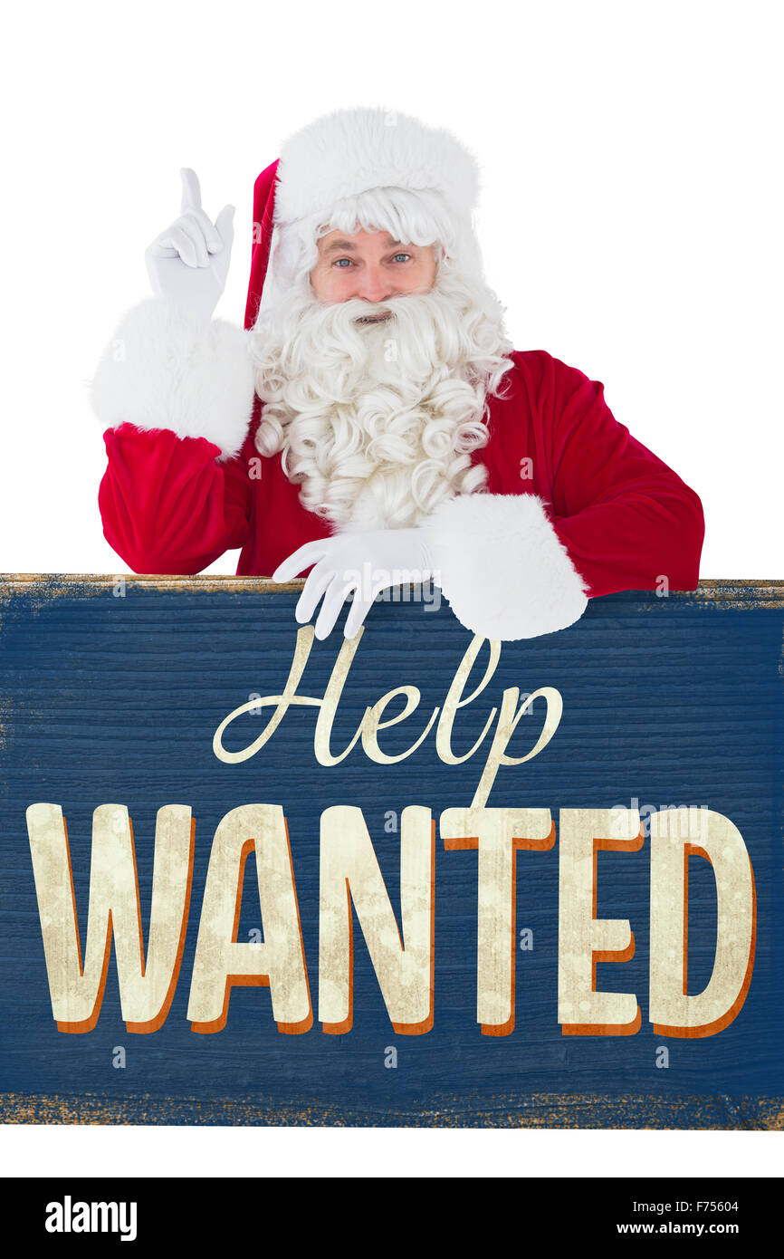 Composite image of smiling santa claus doing a gesture Stock Photo Alamy