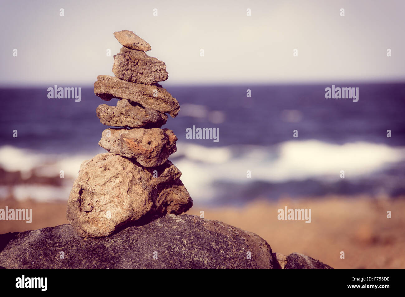 Stack of stones on sea shore, Aruba Stock Photo - Alamy