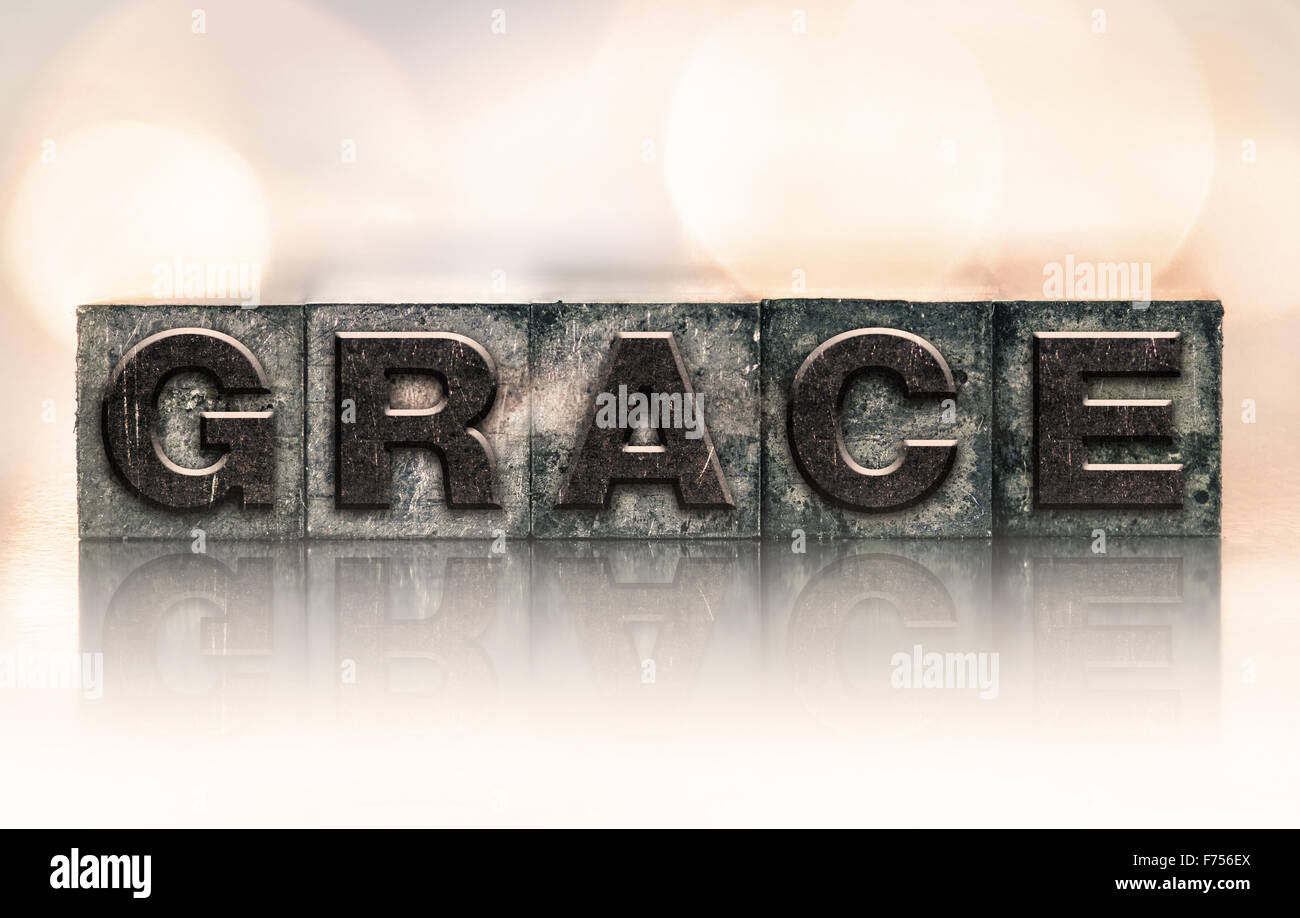 The word "GRACE" written in vintage ink stained letterpress type Stock ...