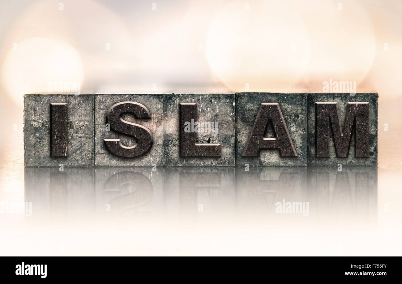 The word "ISLAM" written in vintage ink stained letterpress type Stock ...