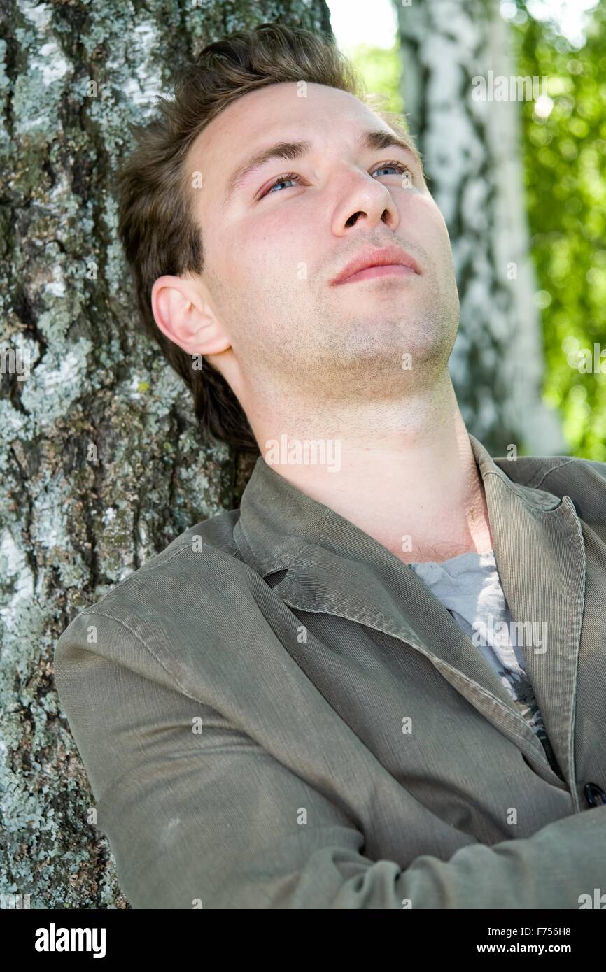 Pensive sad man Stock Photo - Alamy